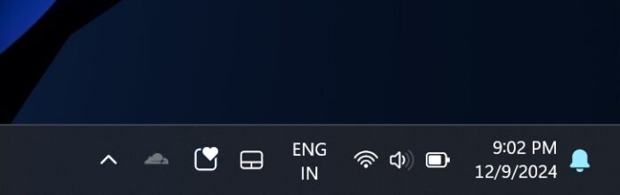 Windows 11 taskbar system tray new feature reminds you to insert emojis ...